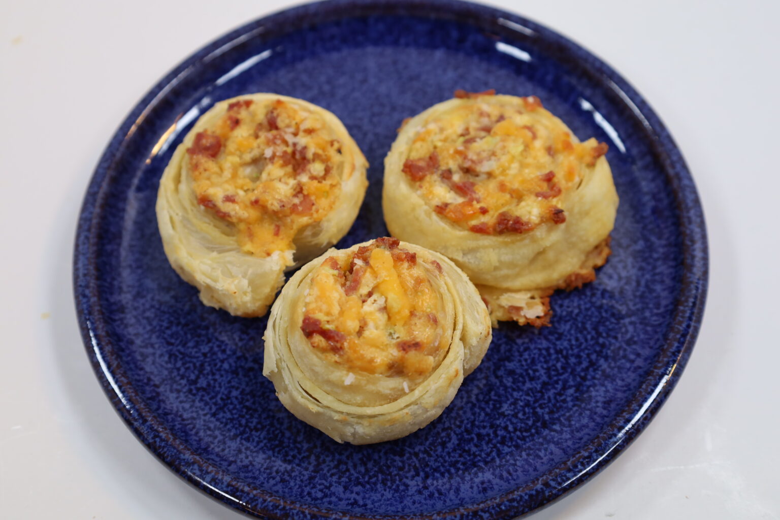 Bacon, Cheese and Puff Pastry Wheels | Wrap It Up by John Peppin, D.O.
